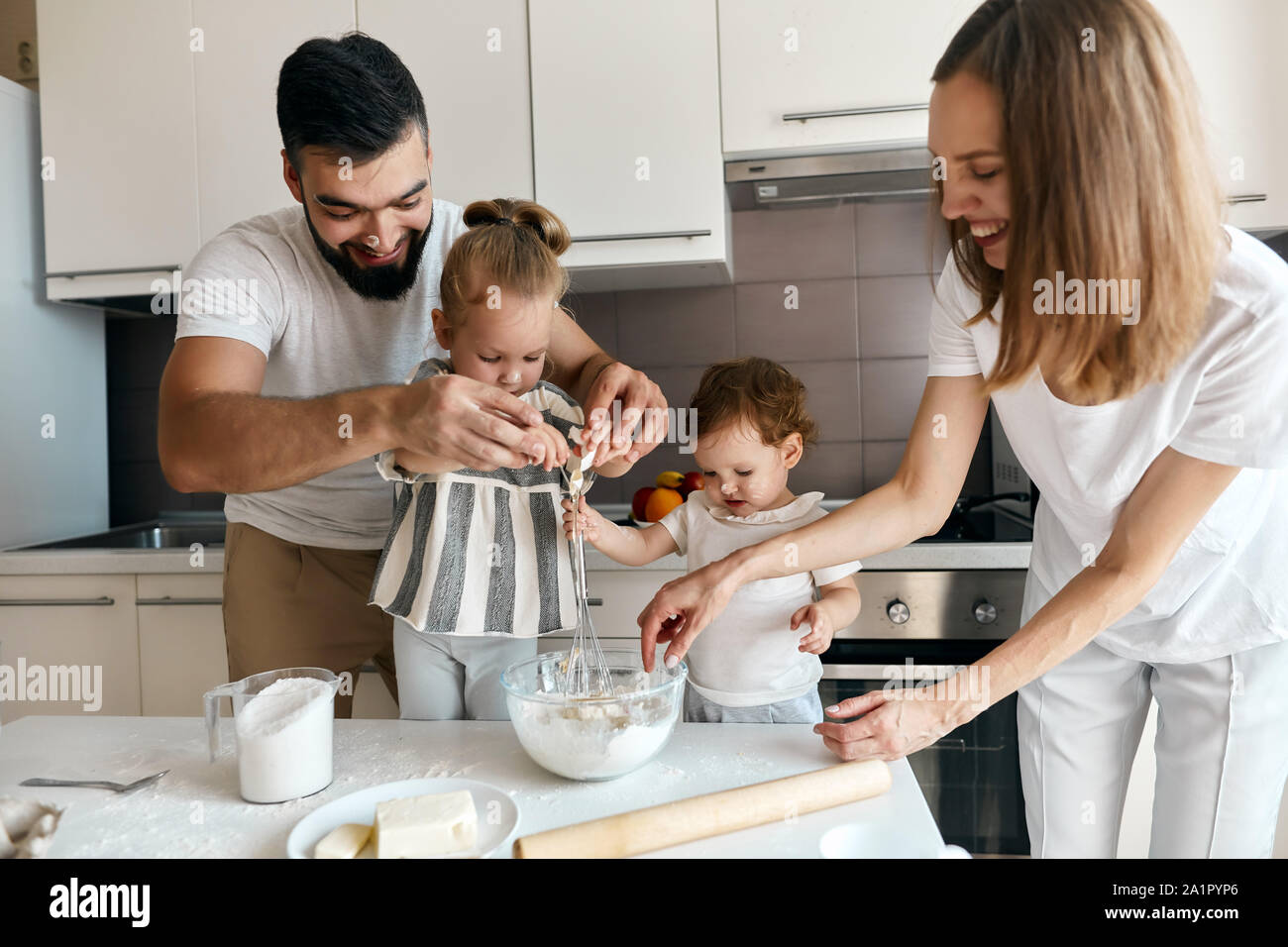 Kids parents cook hi-res stock photography and images - Alamy