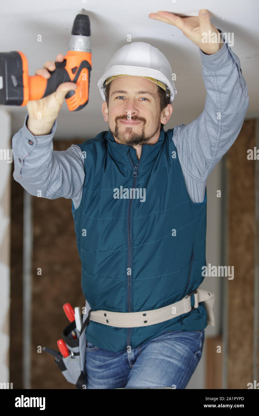 Ceiling drilling installation hi-res stock photography and images - Alamy