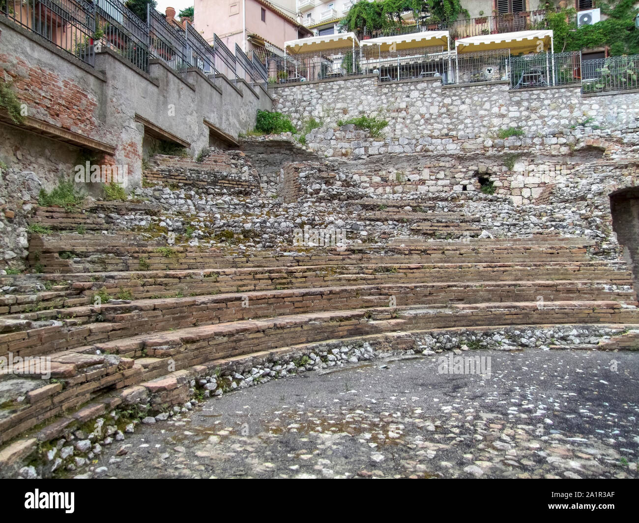 scenery around the Roman Odeon in Taormina in Sicily, Italy Stock Photo ...