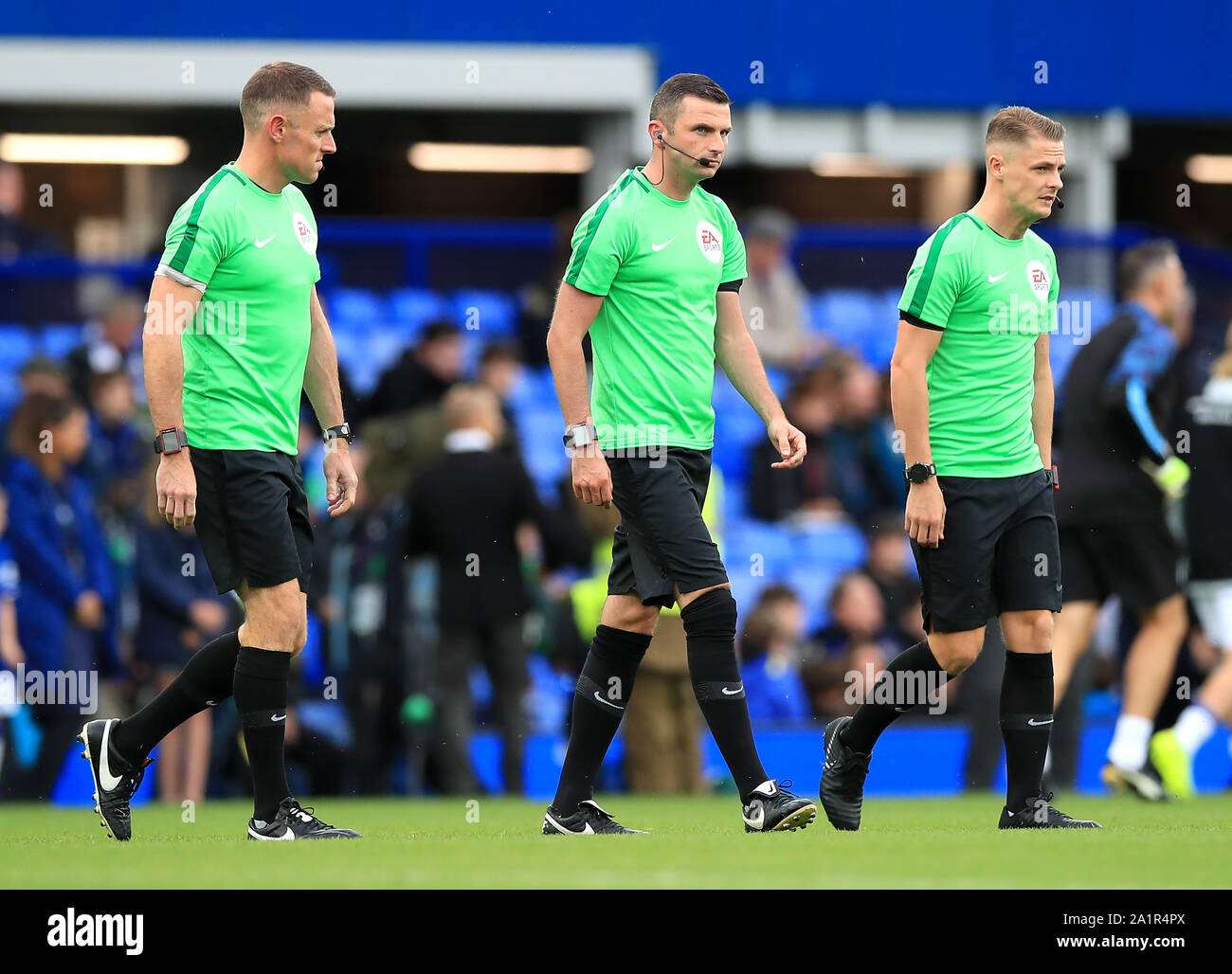 Referee Michael Oliver (centre) during a warm up before the Premier ...