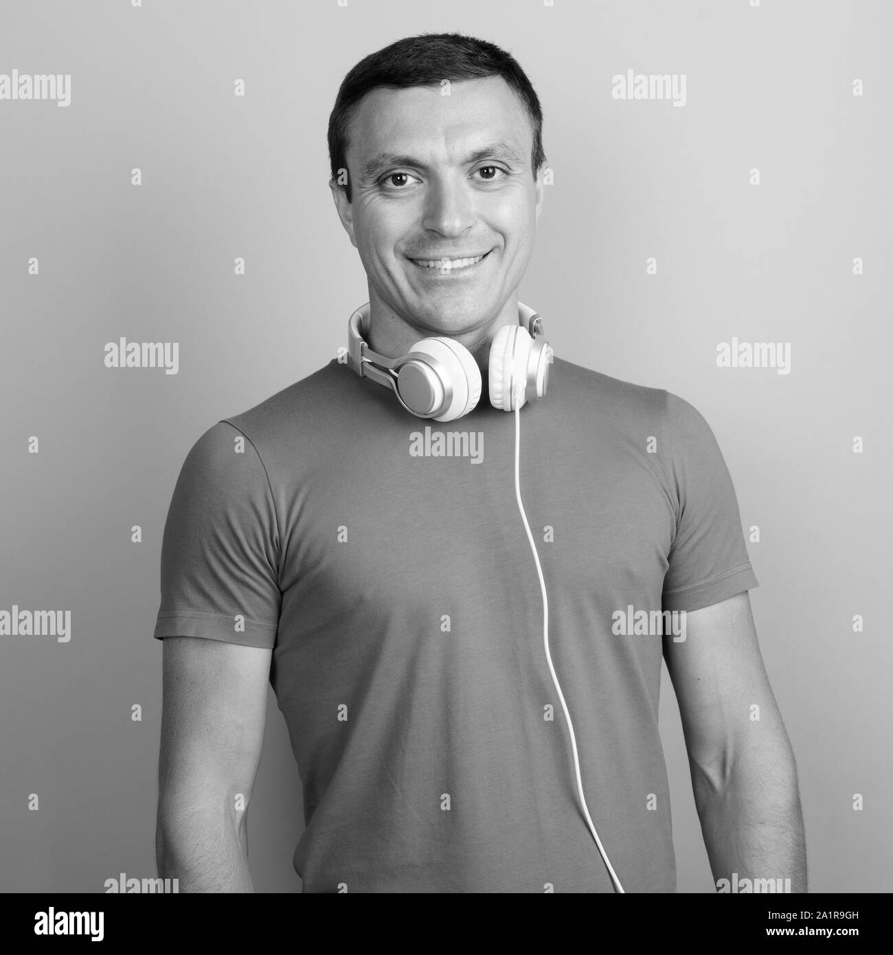 Guy headphones around neck hi-res stock photography and images - Alamy