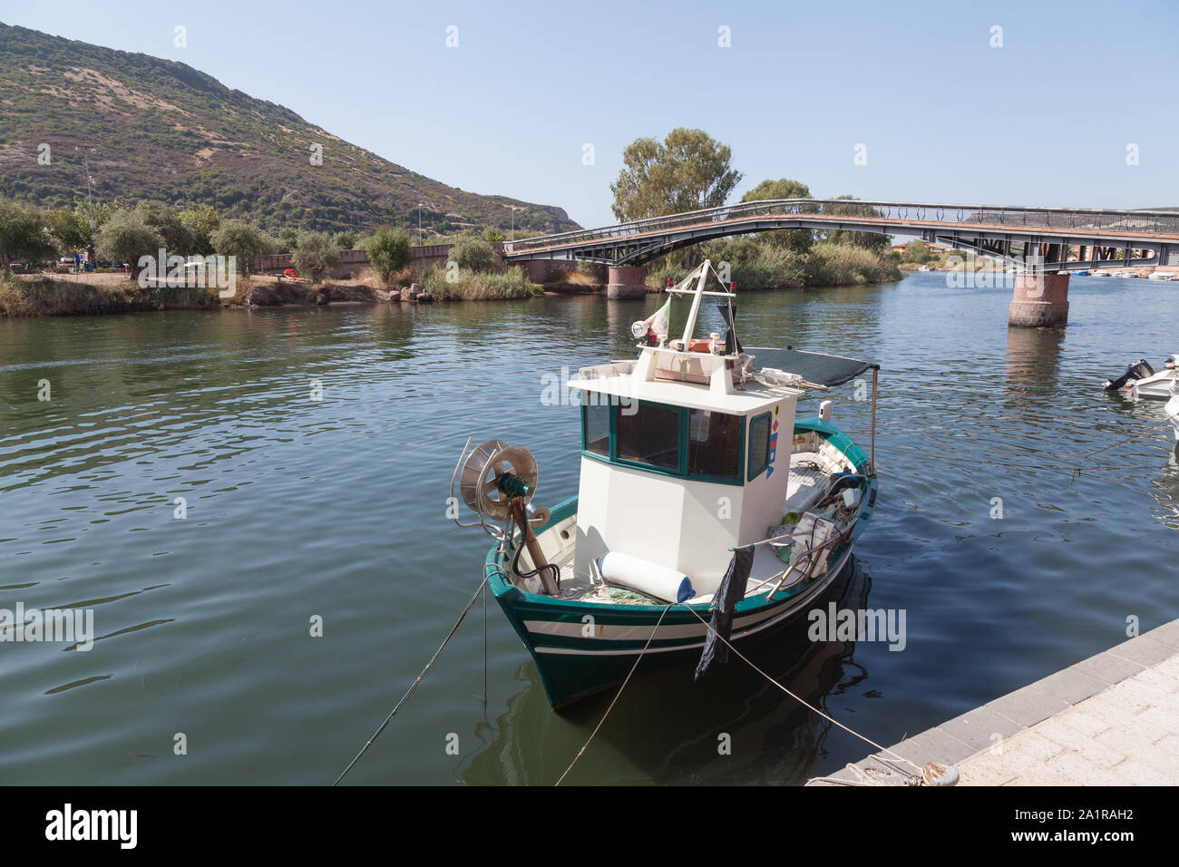 Sardinia fishing boats in harbour in the town Bosa Stock Photo - Alamy