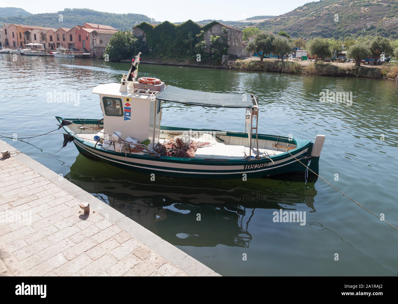 Sardinia fishing boats in harbour in the town Bosa Stock Photo - Alamy