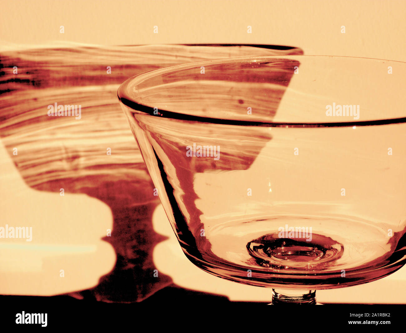 Beautiful crystal glass making shadow on the wall at sunset Stock Photo ...