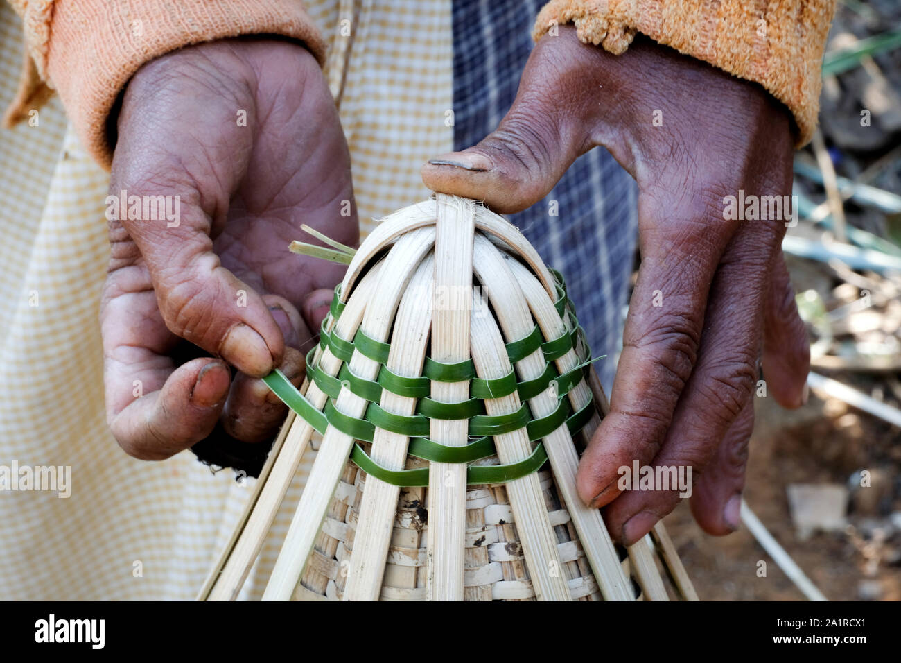 Woman is weaving basket of bamboo. Village Khrang, Khasi-Hills, state ...