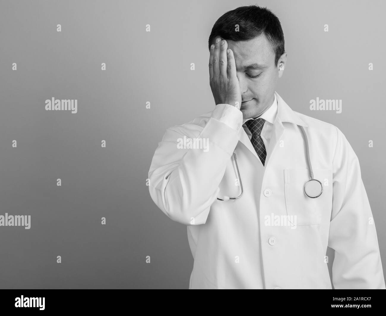 Tired stressed doctor Black and White Stock Photos & Images - Alamy