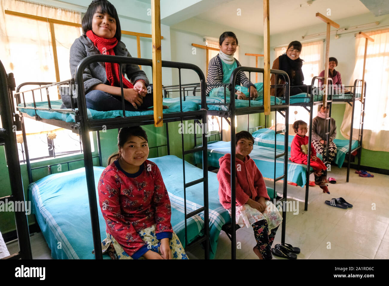 Children are sitting on their beds in the dorm in the "Ferrando Transit ...