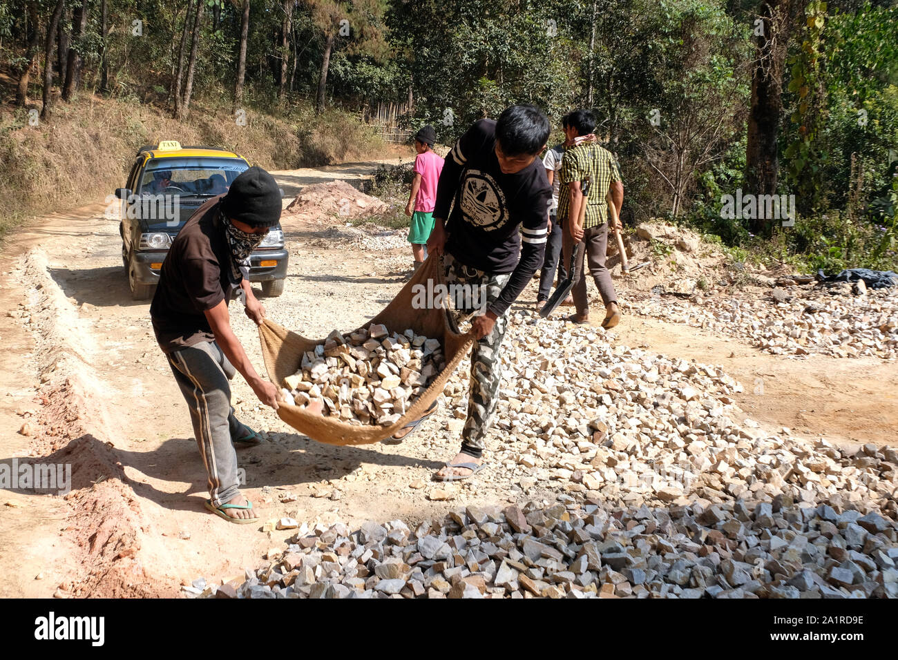 Road construction workers in the Shillong area, Meghalaya State, India ...