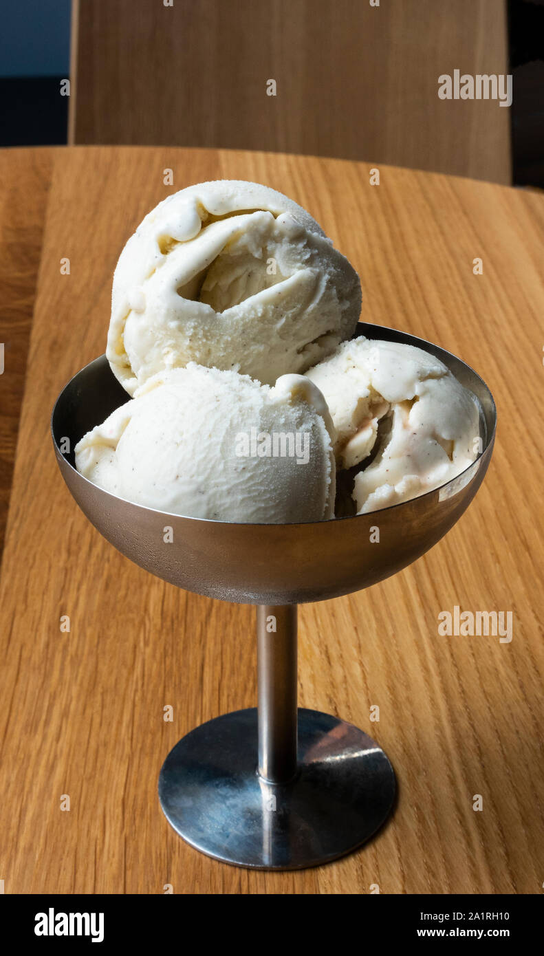 Three scoops of vanilla ice cream Stock Photo - Alamy