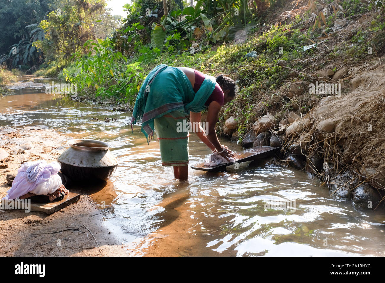 Woman wet clothes in river hi-res stock photography and images - Alamy