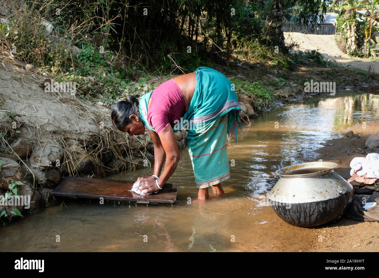 Woman wet clothes in river hi-res stock photography and images - Alamy