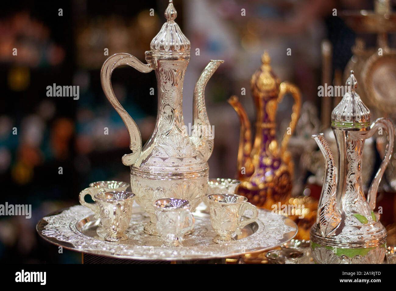 Silver tea set in an oriental gift shop. Tea ceremony Stock Photo - Alamy