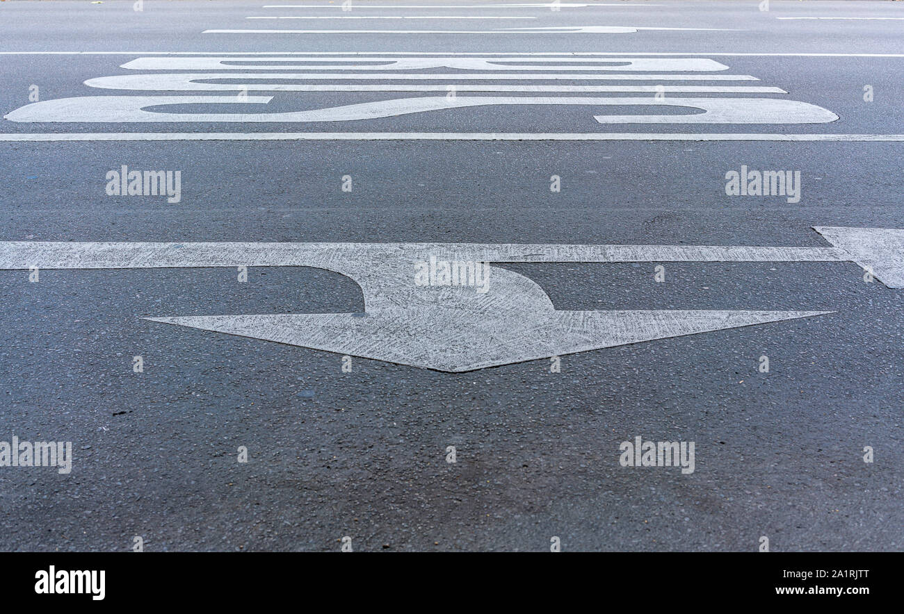 german traffic signs on the street, arrows and bus Stock Photo - Alamy