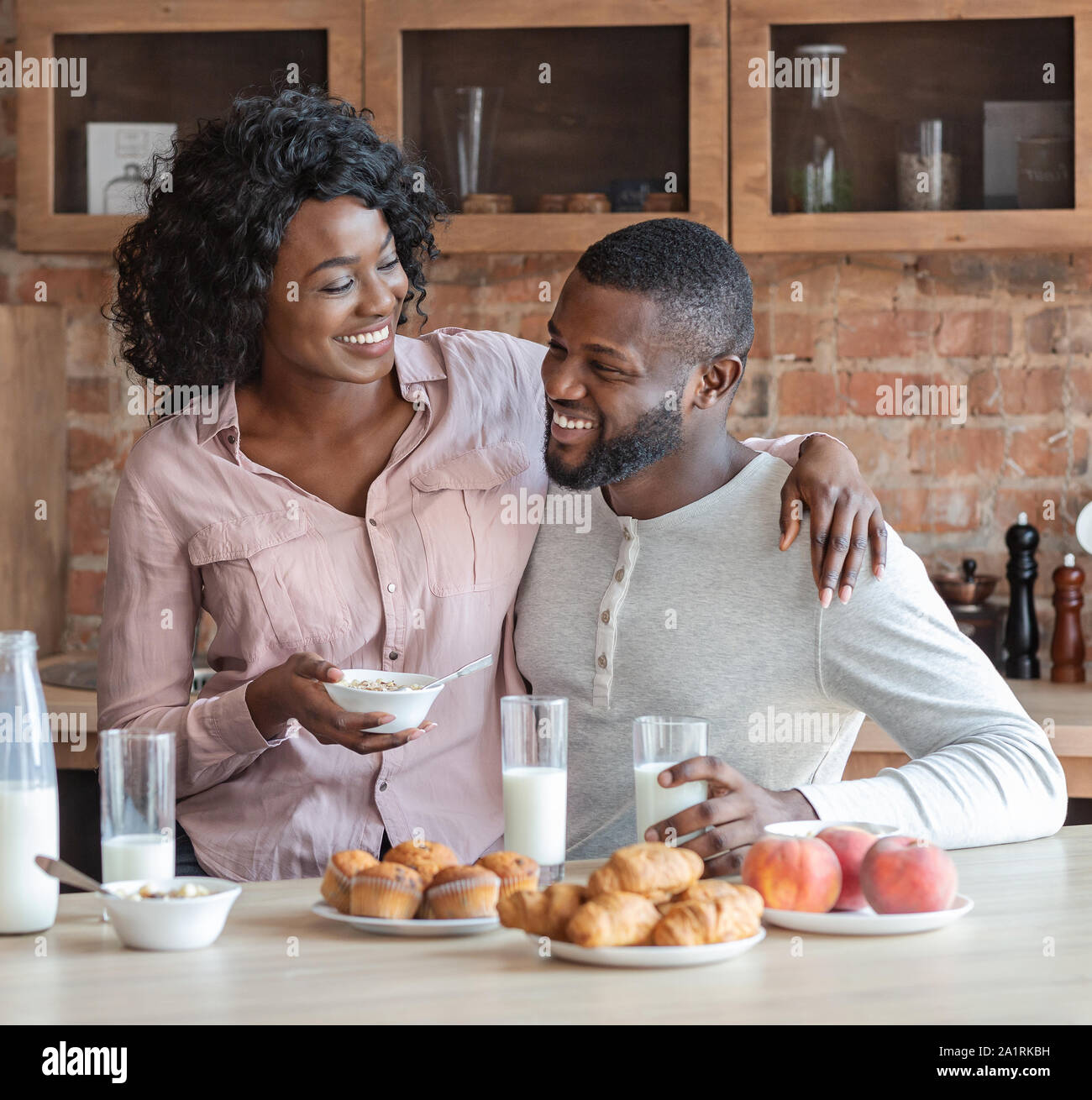 African married couple having breakfast together at home Stock Photo ...