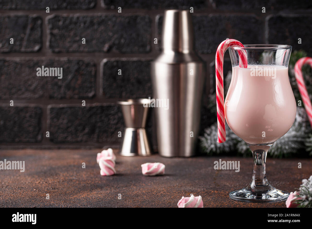 Pink Christmas cocktail with marshmallow Stock Photo - Alamy