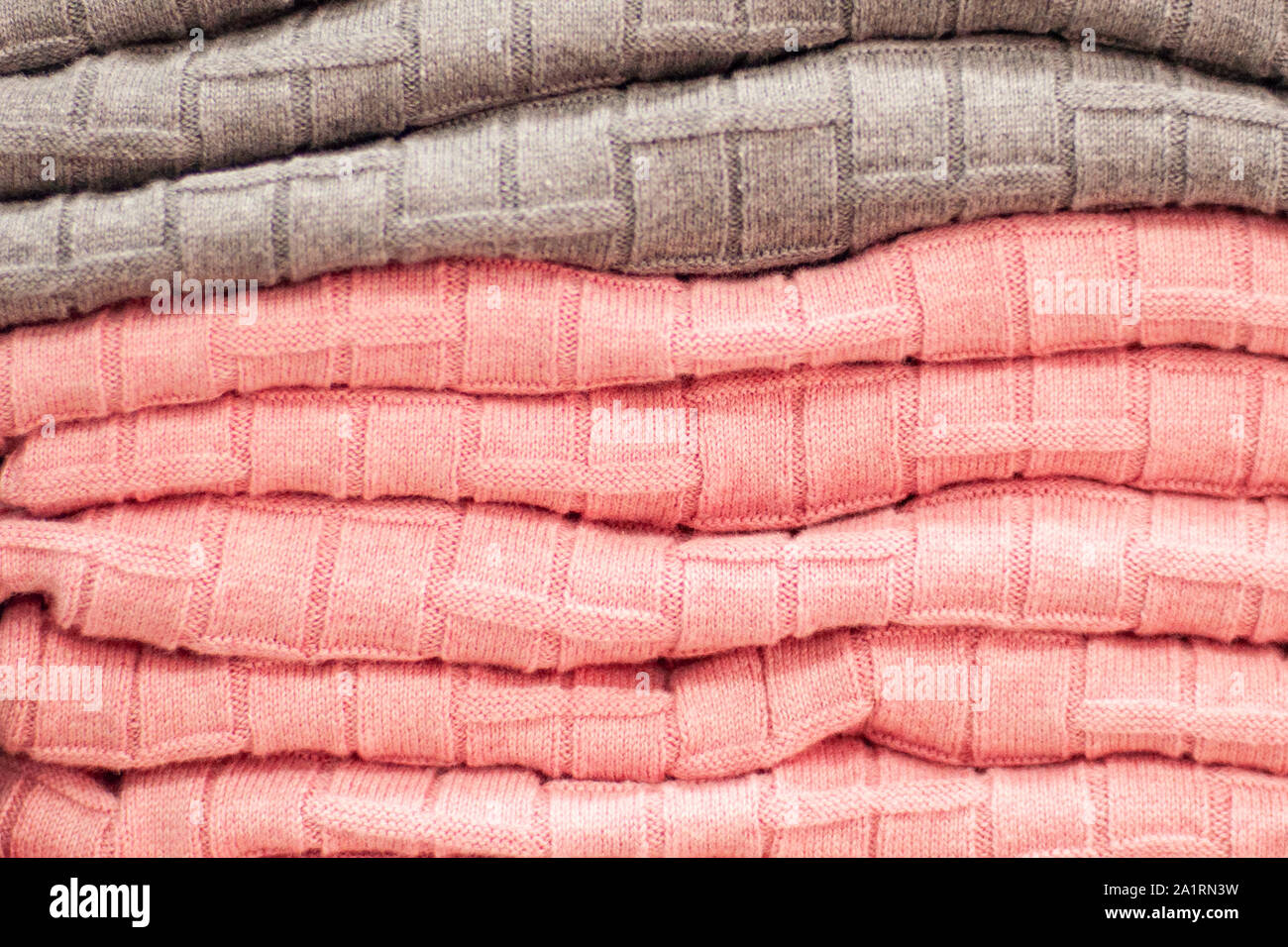 Folded jumpers hi-res stock photography and images - Alamy
