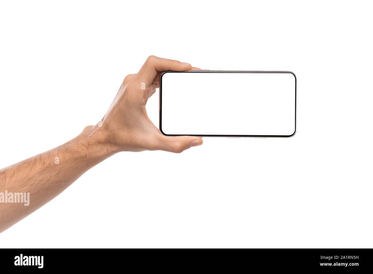 Smartphone with blank screen in horizontal orientation in male hand ...