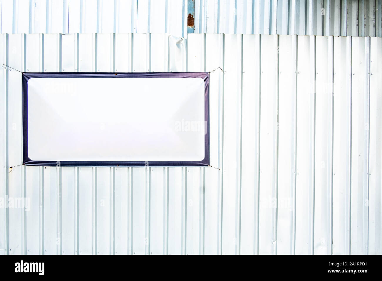 stainless wall with white sign Stock Photo - Alamy