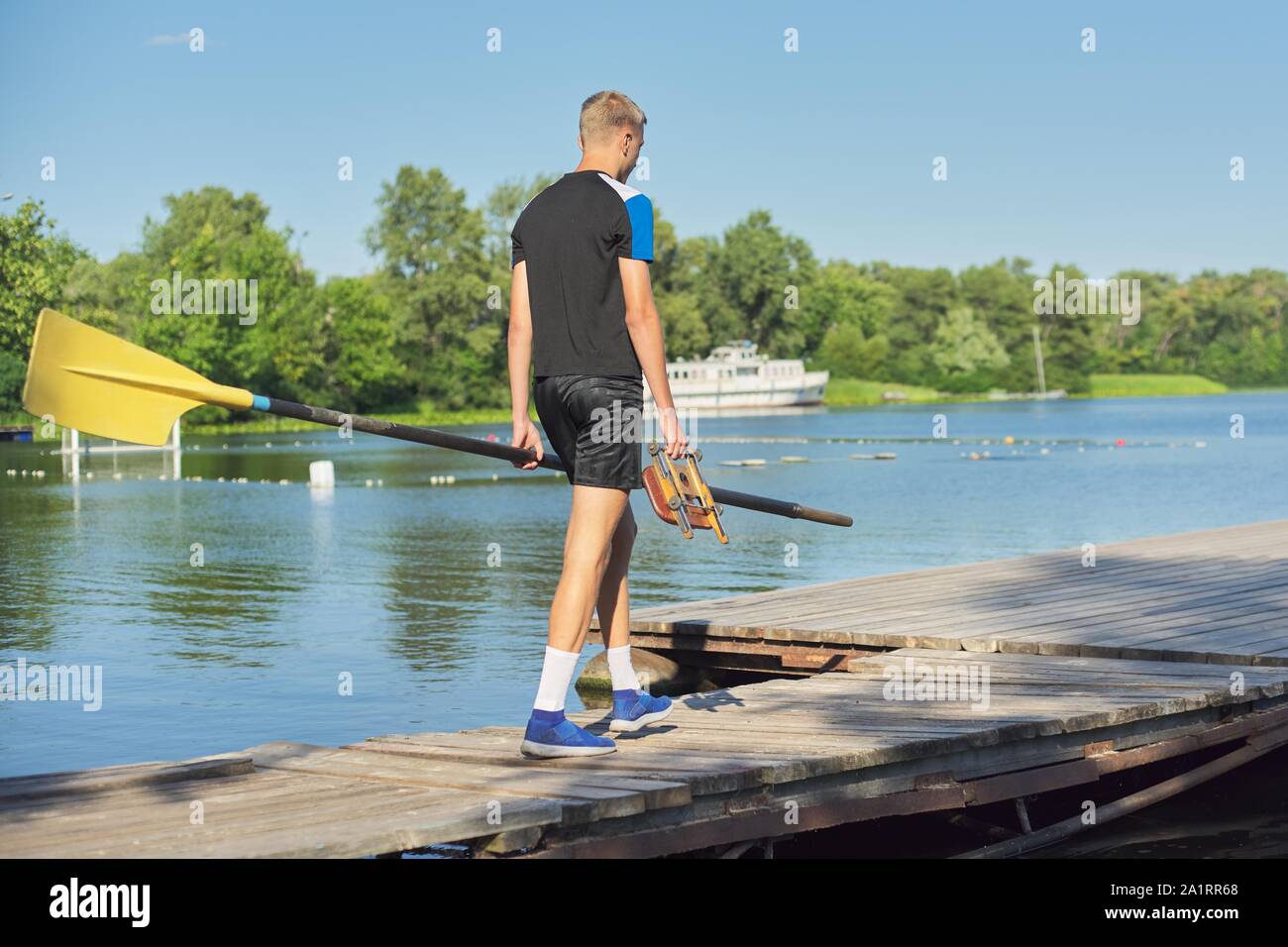Teen rowing boat hi-res stock photography and images - Alamy