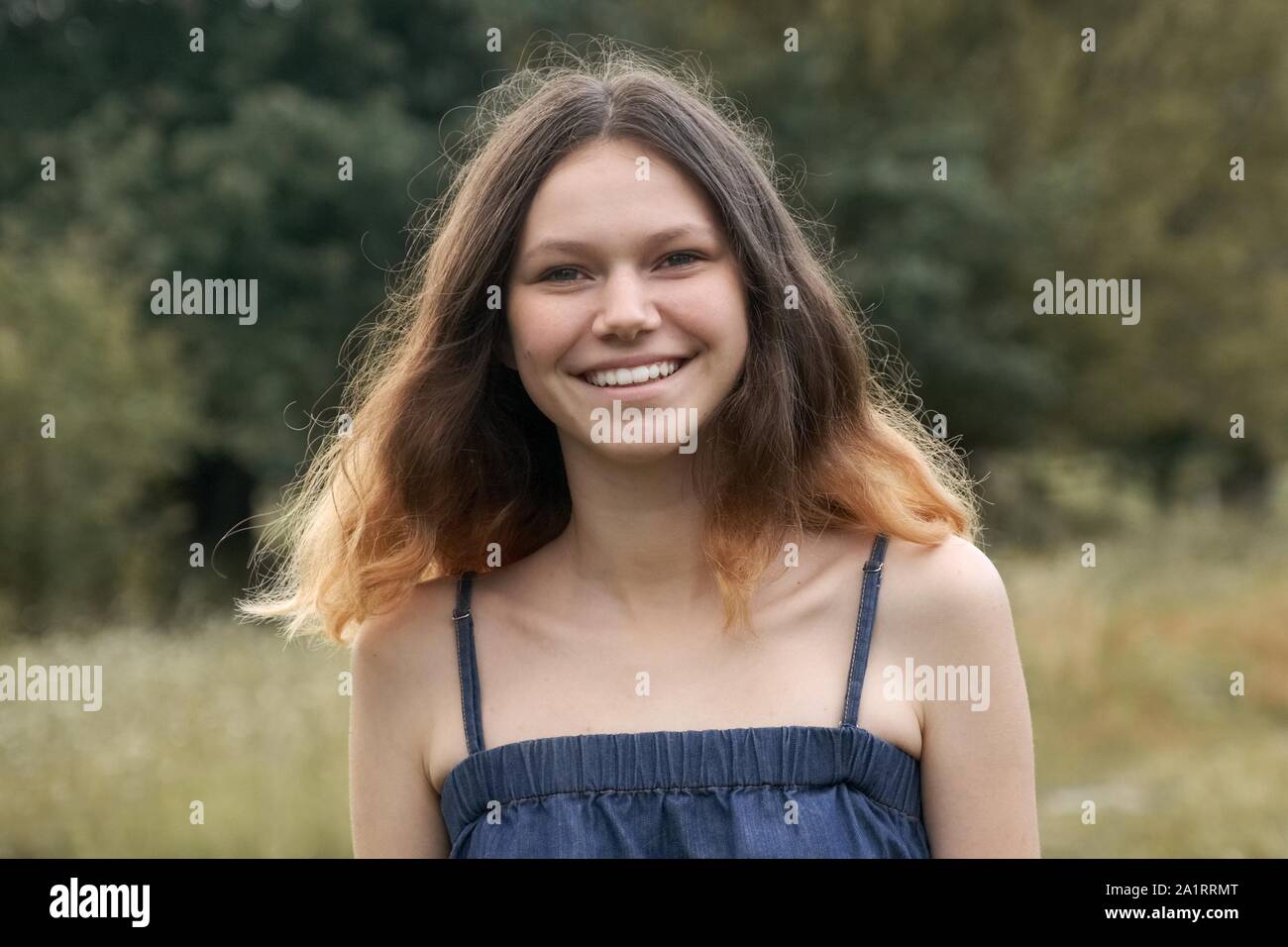 Portrait of beautiful cheerful smiling teenager girl 15 years old, with ...