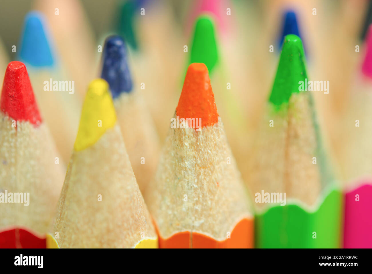 close up stack of colored pencils background Stock Photo - Alamy