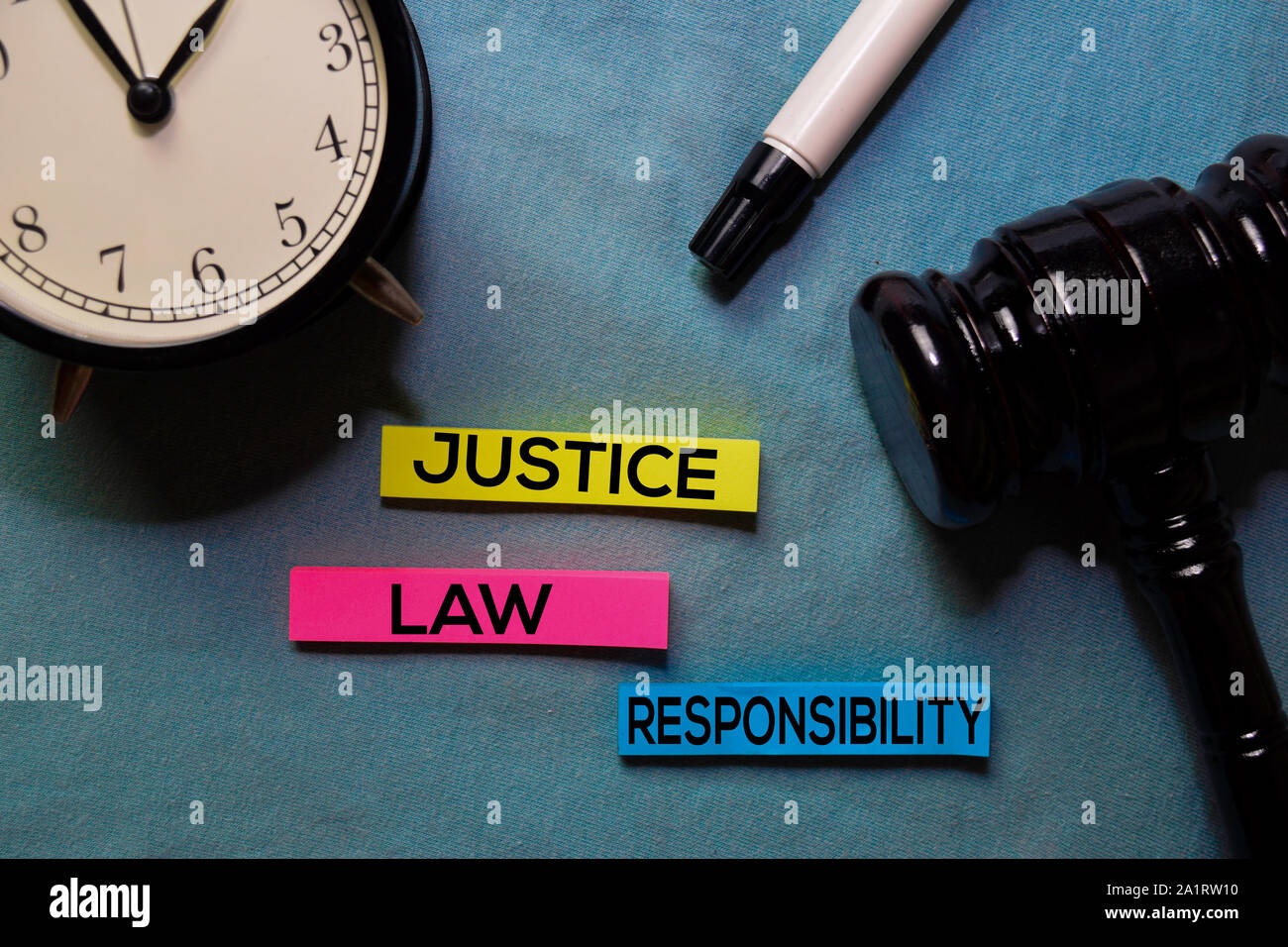 Justice, Law, and Responsibility on sticky notes and gavel isolated on ...