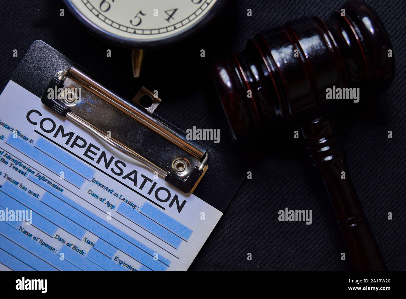 Compensation text on Document and gavel isolated on office desk. Law ...