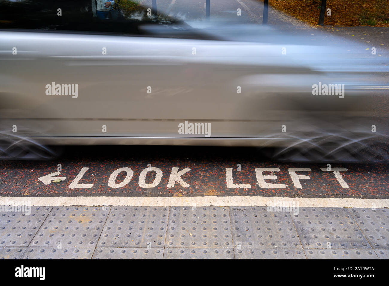 Zebra crossing with moving car pedestrian hi-res stock photography and ...