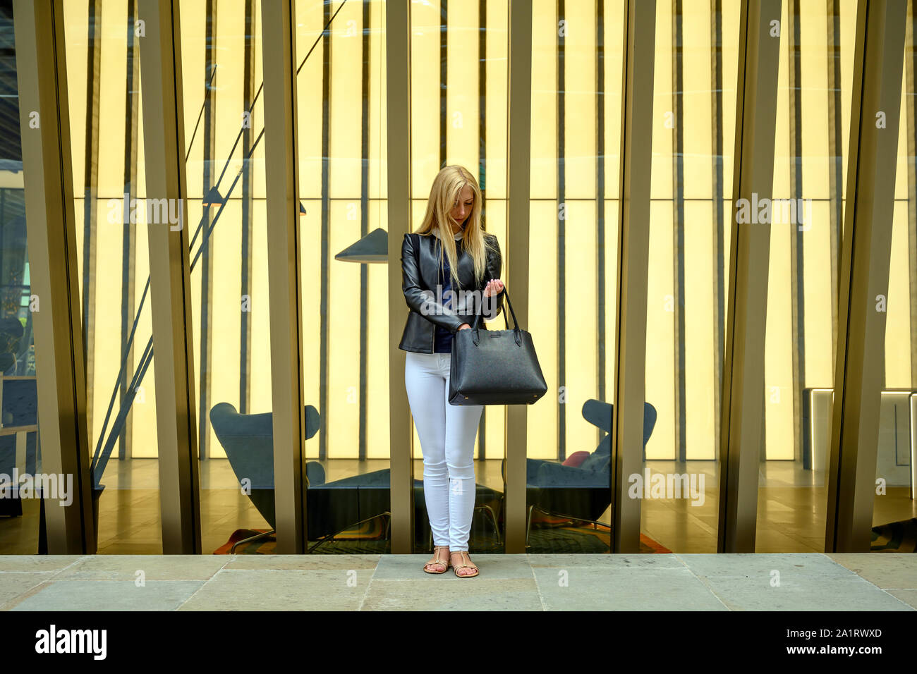 Business people waiting outside office hi-res stock photography and ...