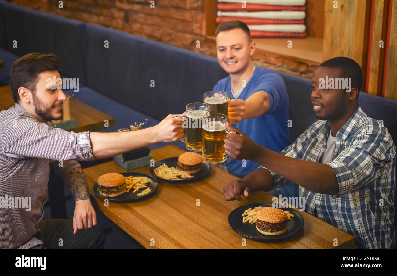 Clinking mugs hi-res stock photography and images - Alamy