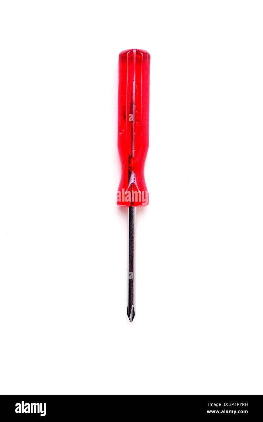Screw driver with clear plastic red handle, isolated on white ...