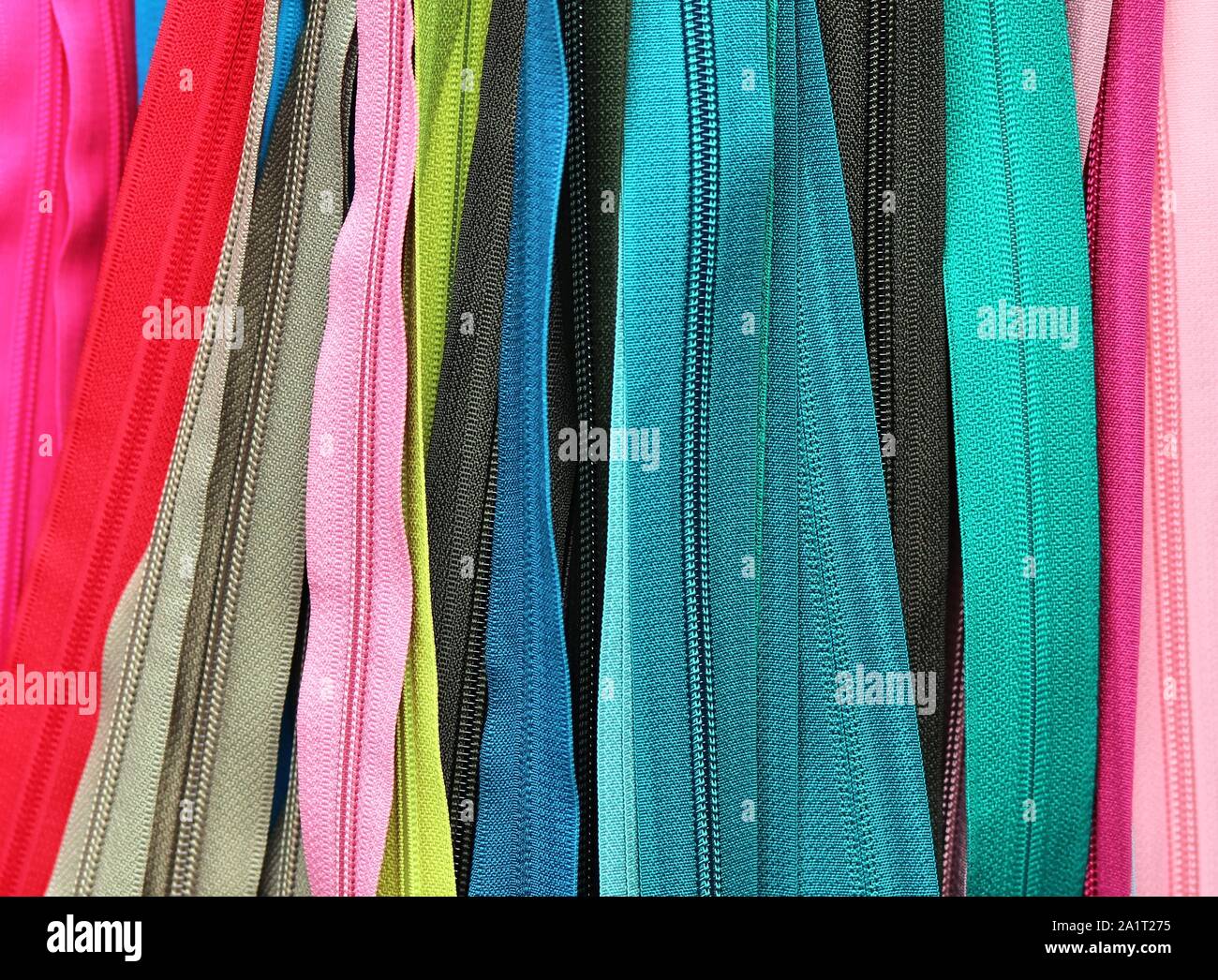Colorful detailed fabric textures of different cloth types in a close ...