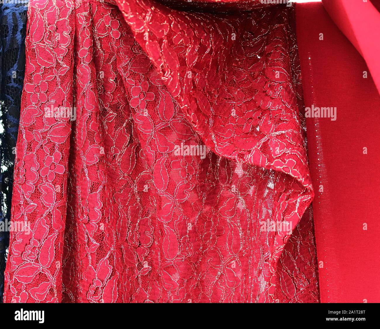 Colorful detailed fabric textures of different cloth types in a close ...
