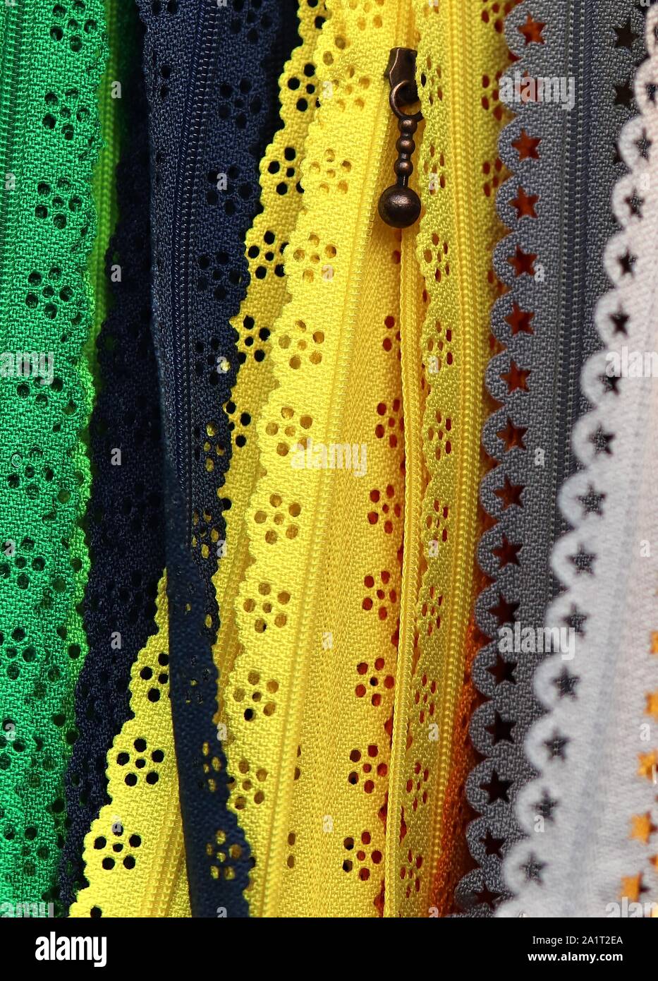 Colorful detailed fabric textures of different cloth types in a close ...