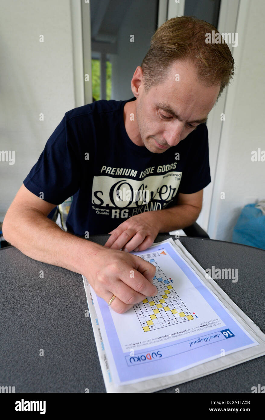 Engelskirchen, Germany. 27th Sep, 2019. Postman Michael Ley writes in a ...