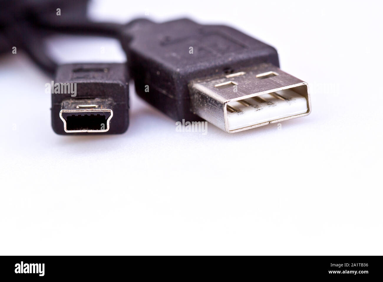 Dusty used USB plug on white background Stock Photo - Alamy