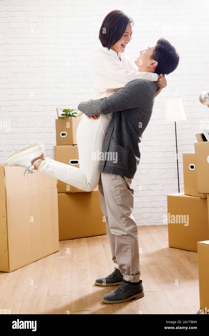 Young couple hug Stock Photo - Alamy