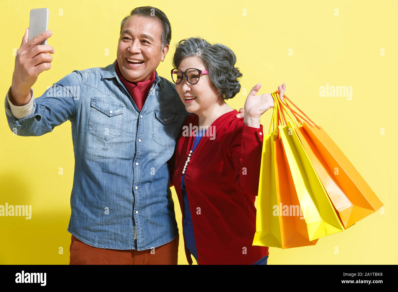 Shopping happy old man Stock Photo - Alamy
