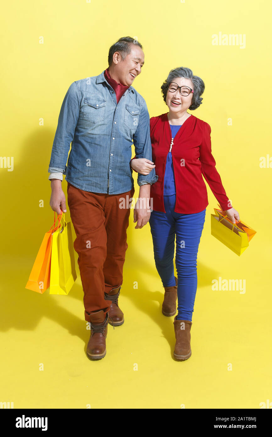 Shopping happy old man Stock Photo - Alamy