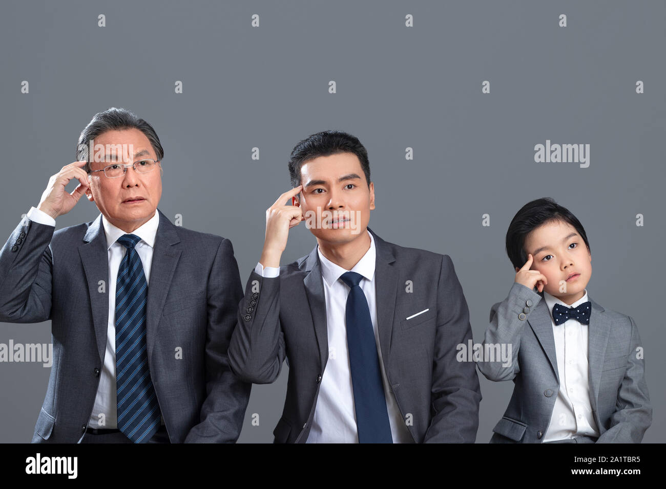 Three people between the two generations Stock Photo - Alamy