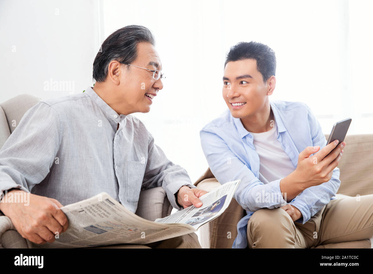 Happiness and the use of mobile phones Stock Photo - Alamy