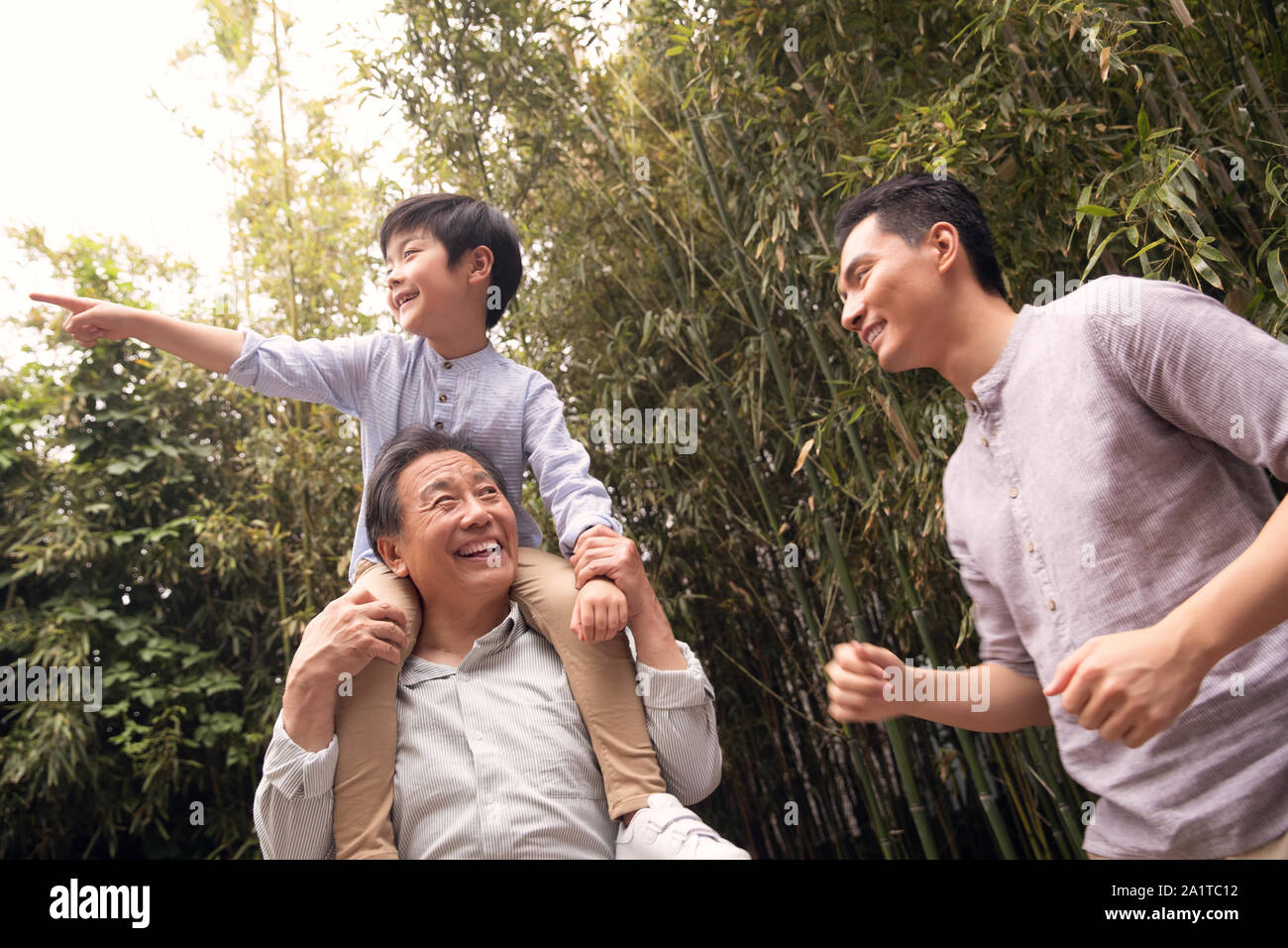 Grandchildren playing outside Stock Photo - Alamy