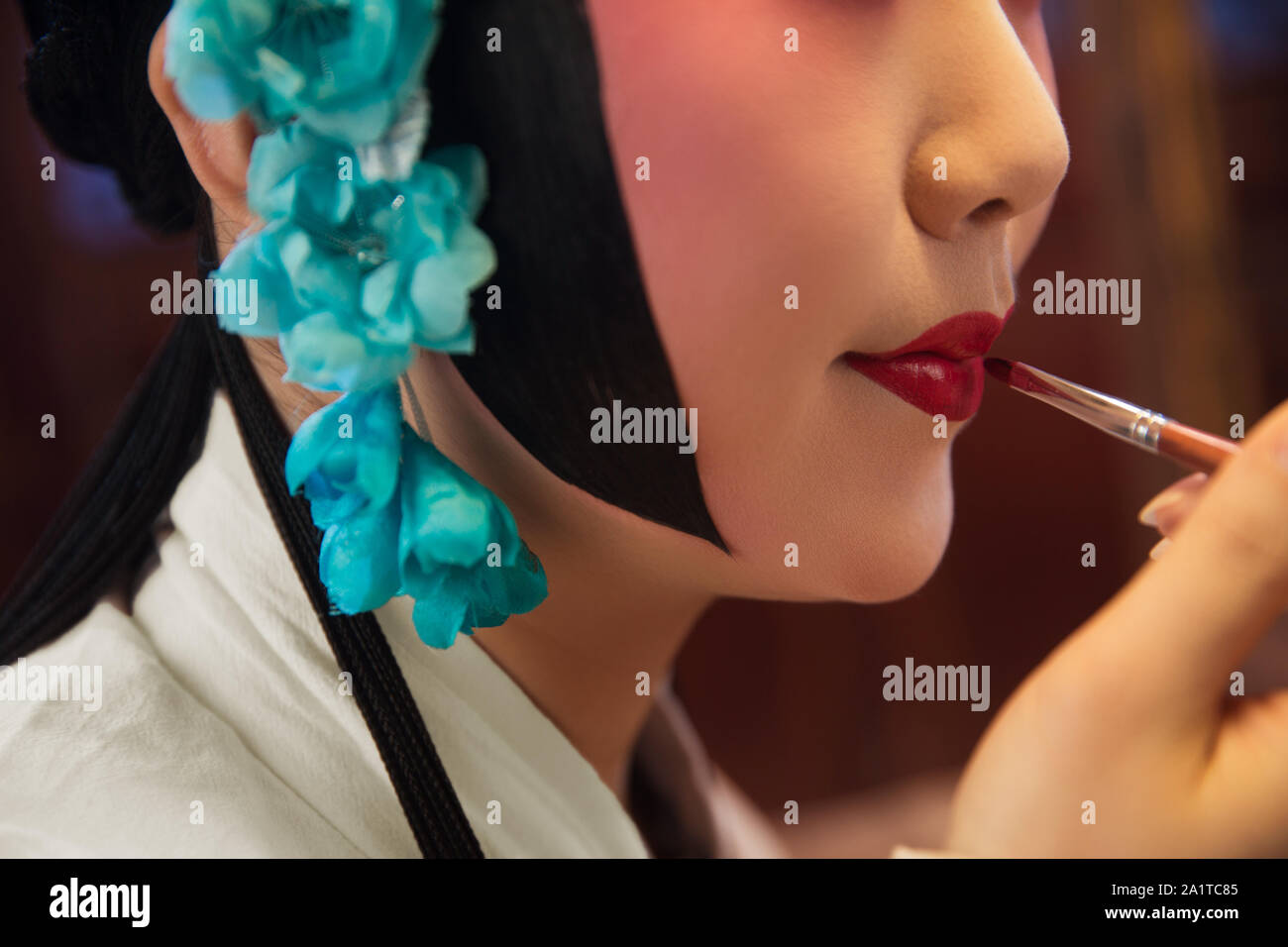 Female Peking Opera actor backstage makeup Stock Photo - Alamy
