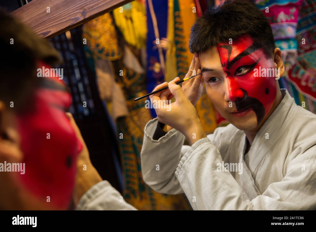 Male Peking Opera actor backstage makeup Stock Photo - Alamy