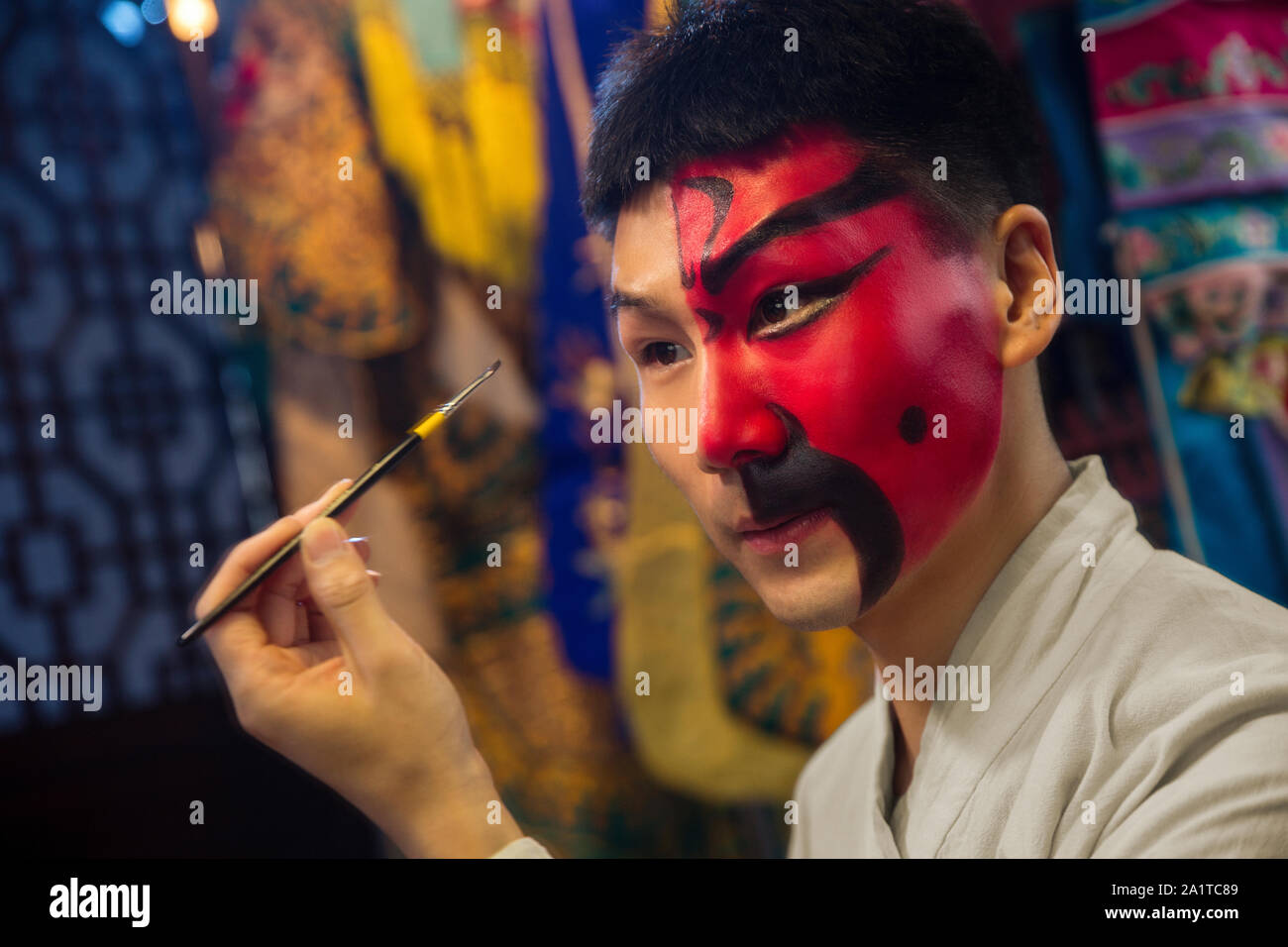 Chinese beijing opera performer applying hi-res stock photography and ...