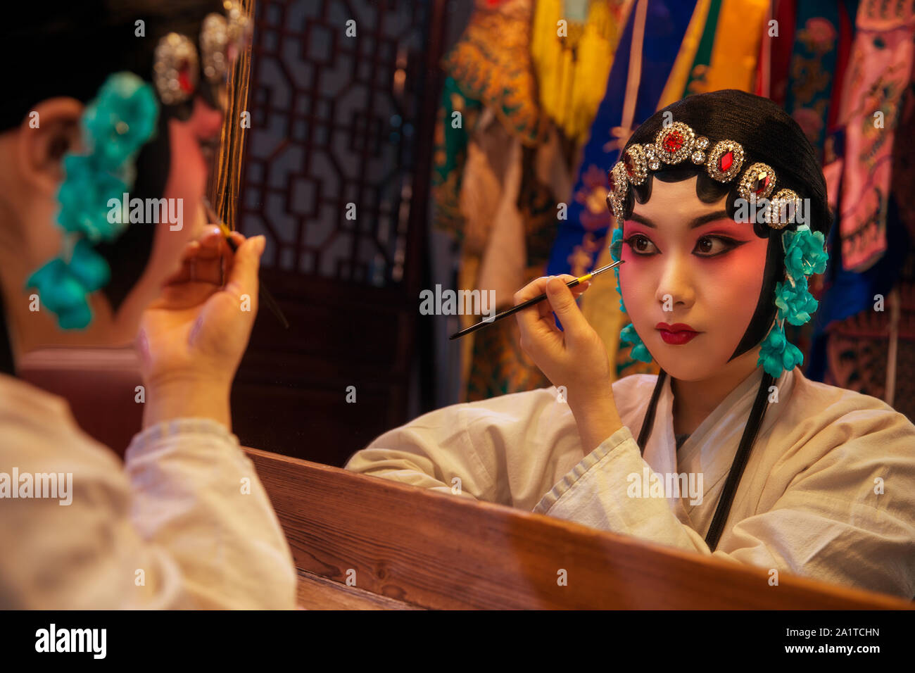 Female Peking Opera actor backstage makeup Stock Photo - Alamy