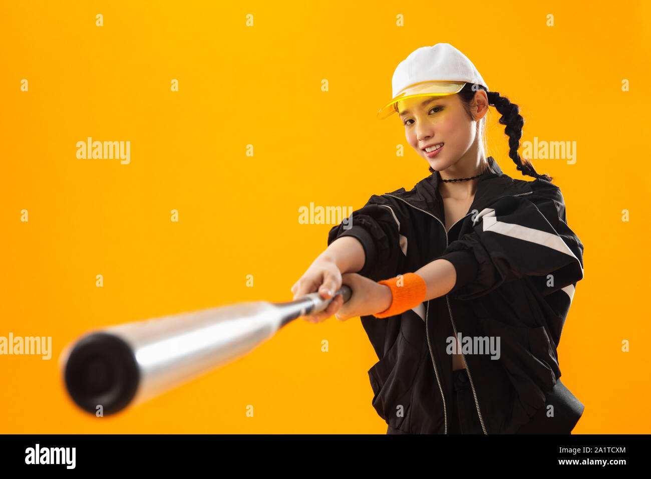 Young girls play baseball Stock Photo - Alamy