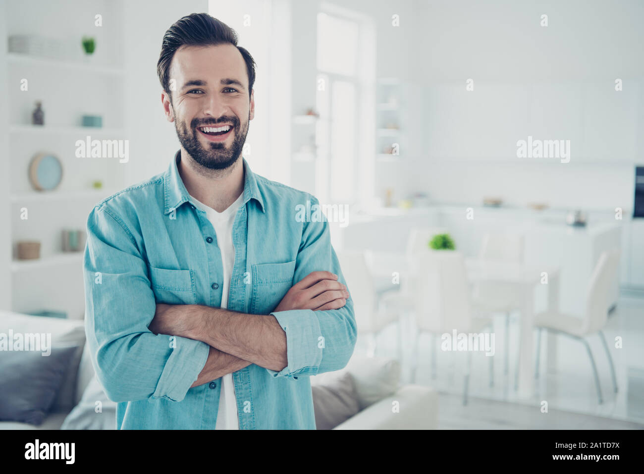 Good-wearing bearded man crossed folded hands over chest look at Stock ...