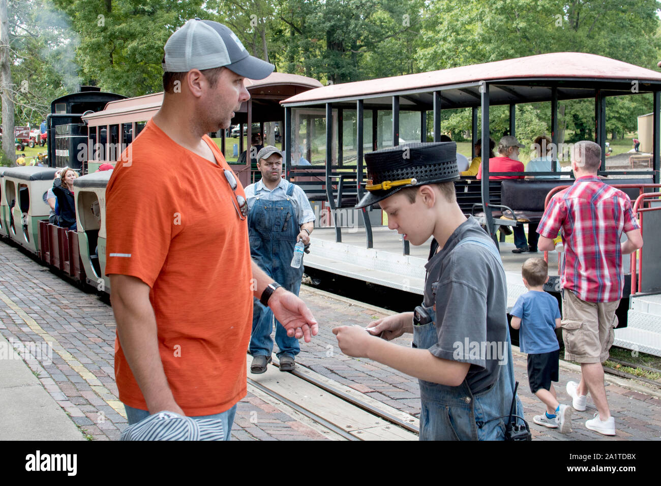 Old fashioned train conductor hi-res stock photography and images - Alamy