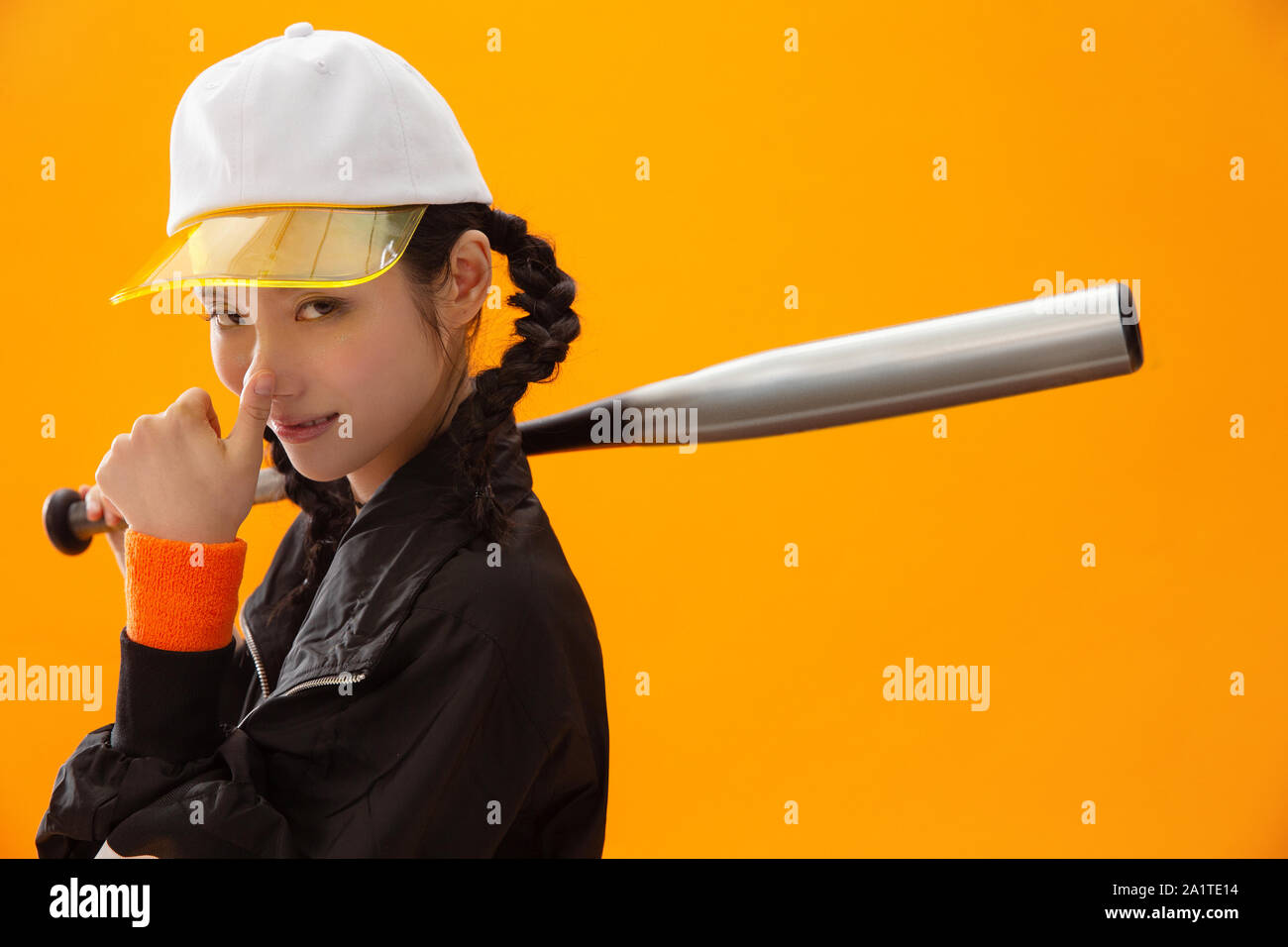 Young girls play baseball Stock Photo - Alamy
